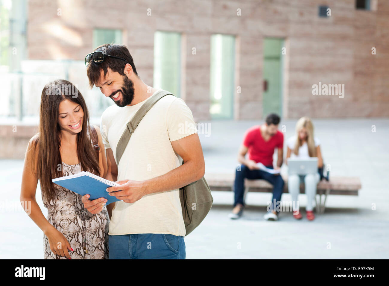 Group of students on campus grounds Stock Photo - Alamy