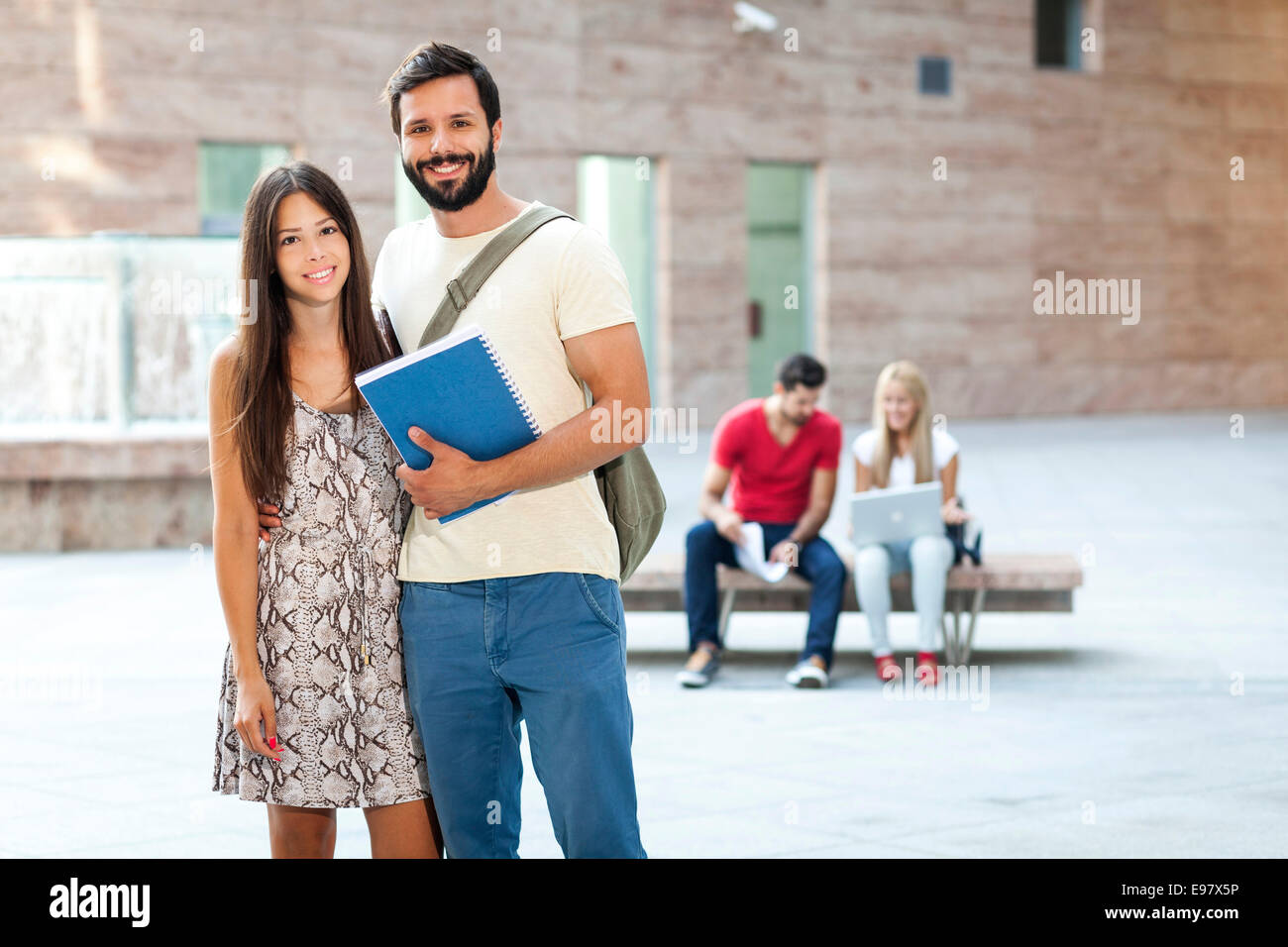 Group of students on campus grounds Stock Photo - Alamy