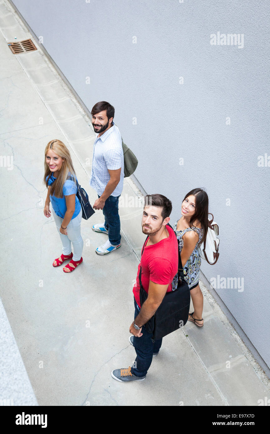 Group of university students standing on campus Stock Photo - Alamy