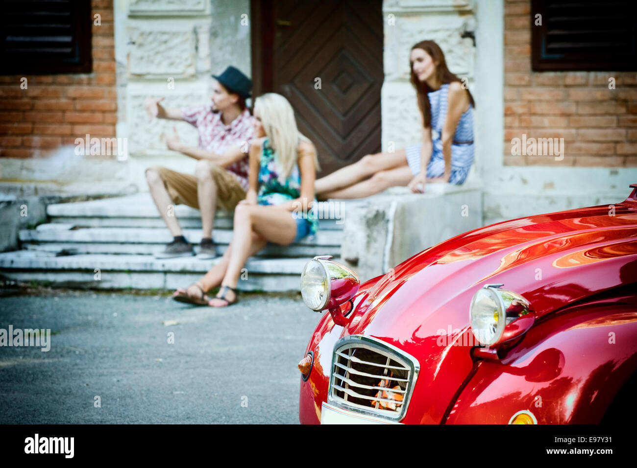 Young people on their road trip taking a break Stock Photo - Alamy