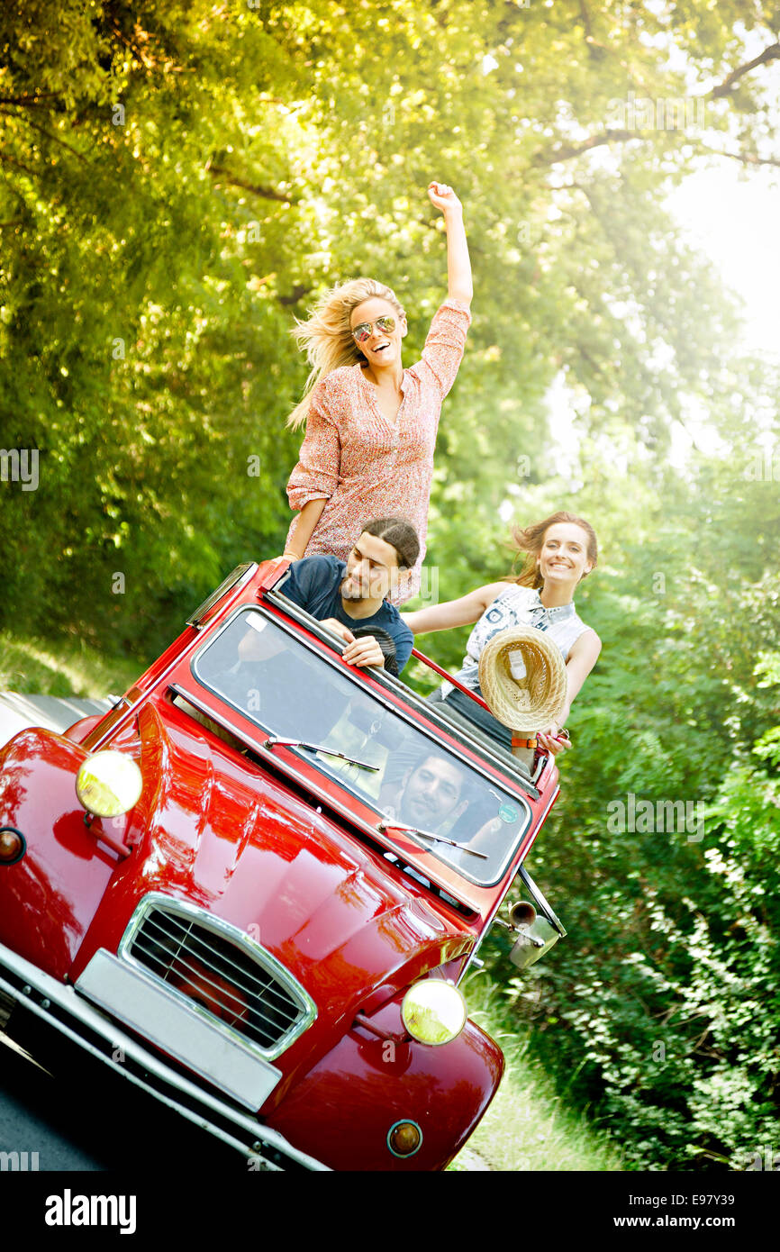 Four people driving in the car hi-res stock photography and images - Alamy