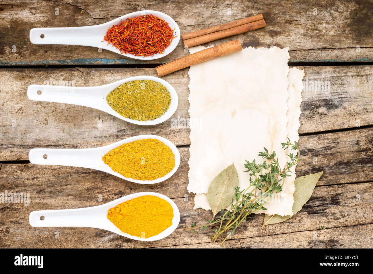 Spices recipe background. Variety of condiments with recipe sheet on ...