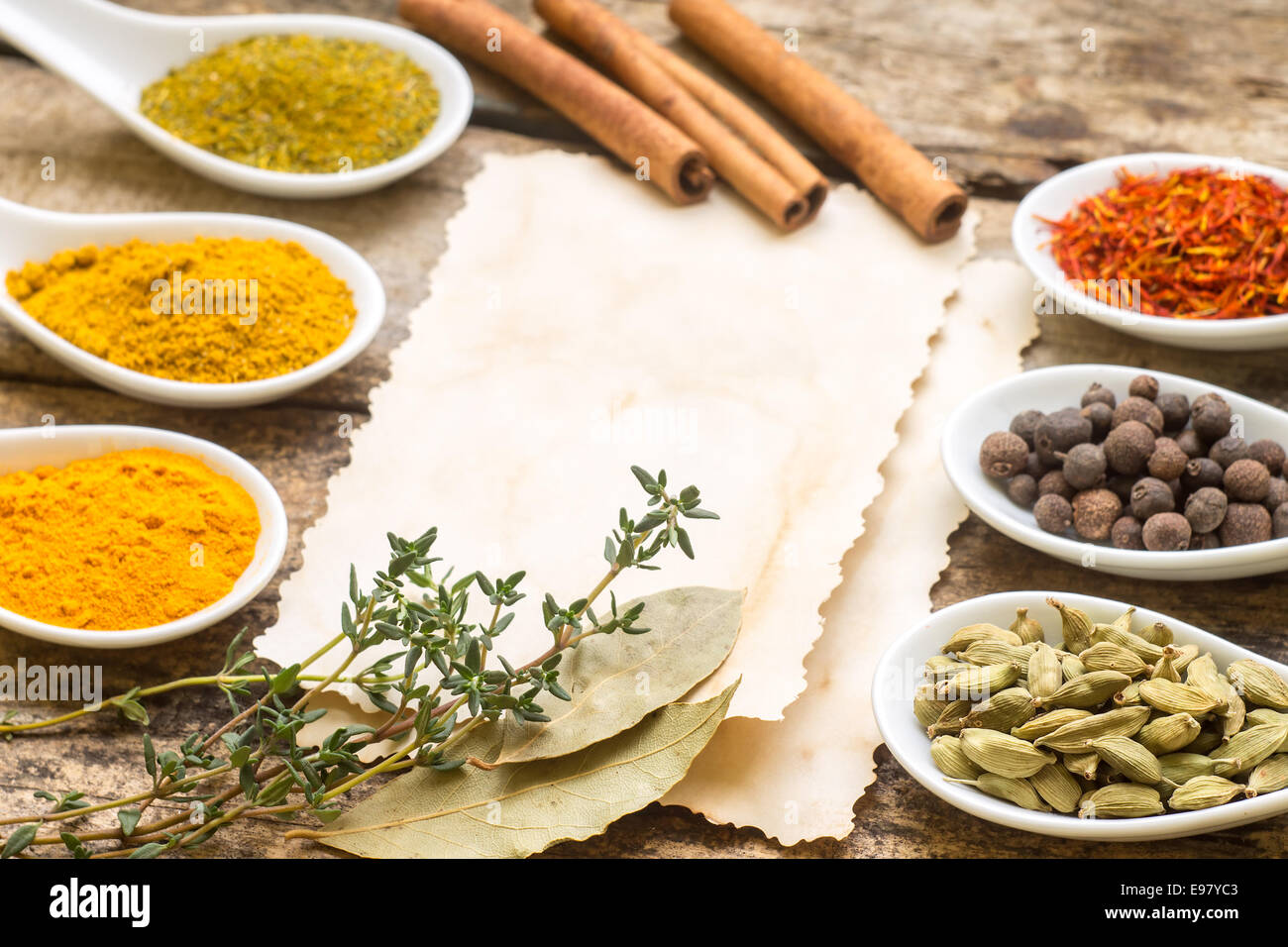 Diversity of Spices on wood background with blank paper sheet Stock ...