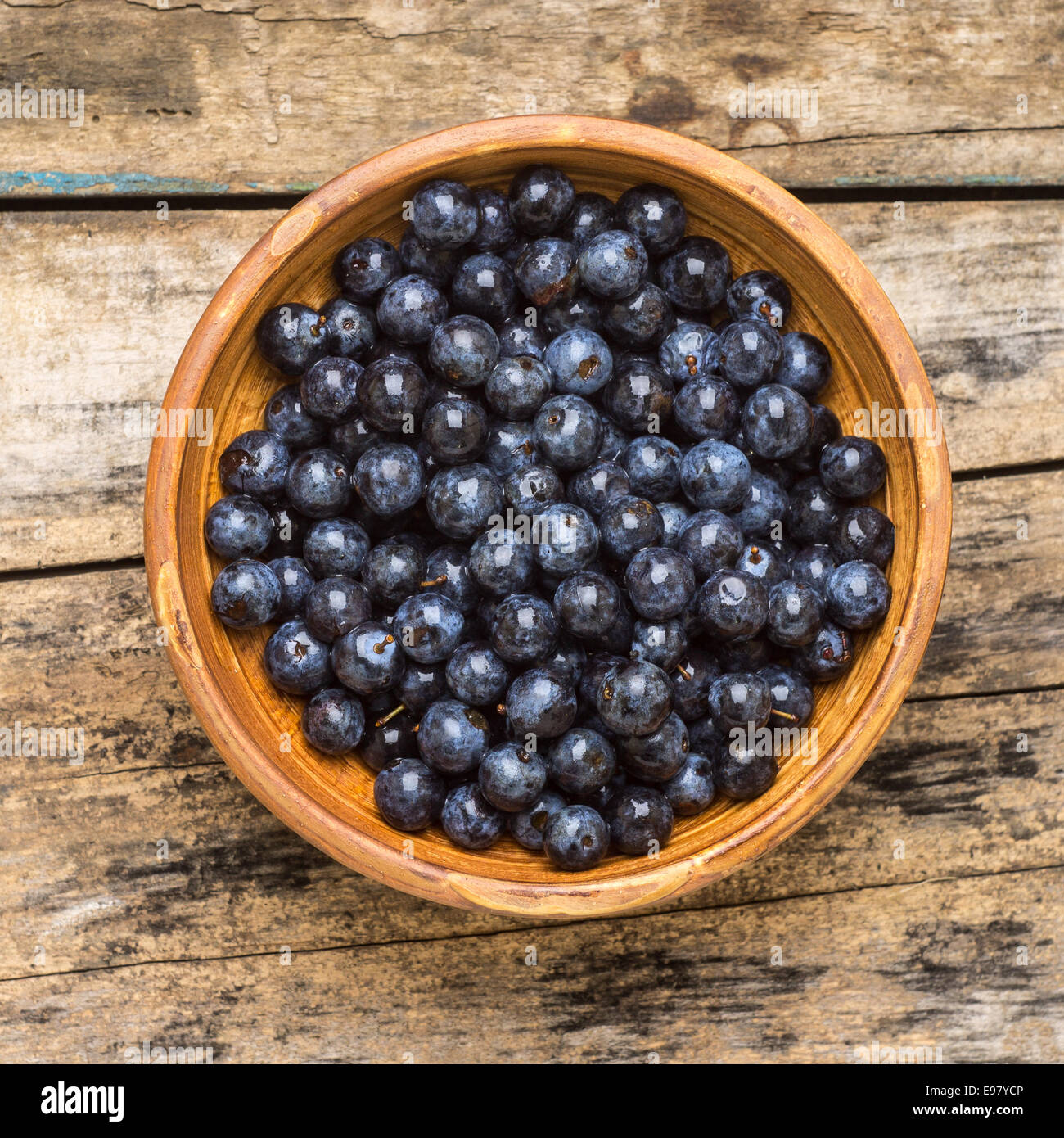 Top view of fresh wild berries on wood background Stock Photo - Alamy