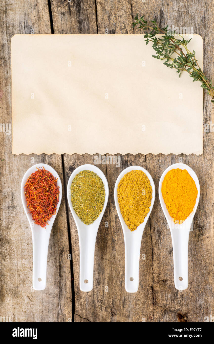 Recipe spice background. Various spicy mix with old paper sheet with ...