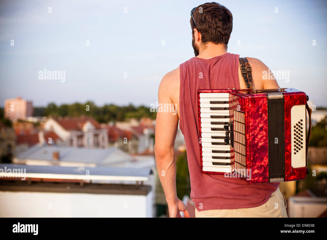 Man on roof terrace hi-res stock photography and images - Alamy