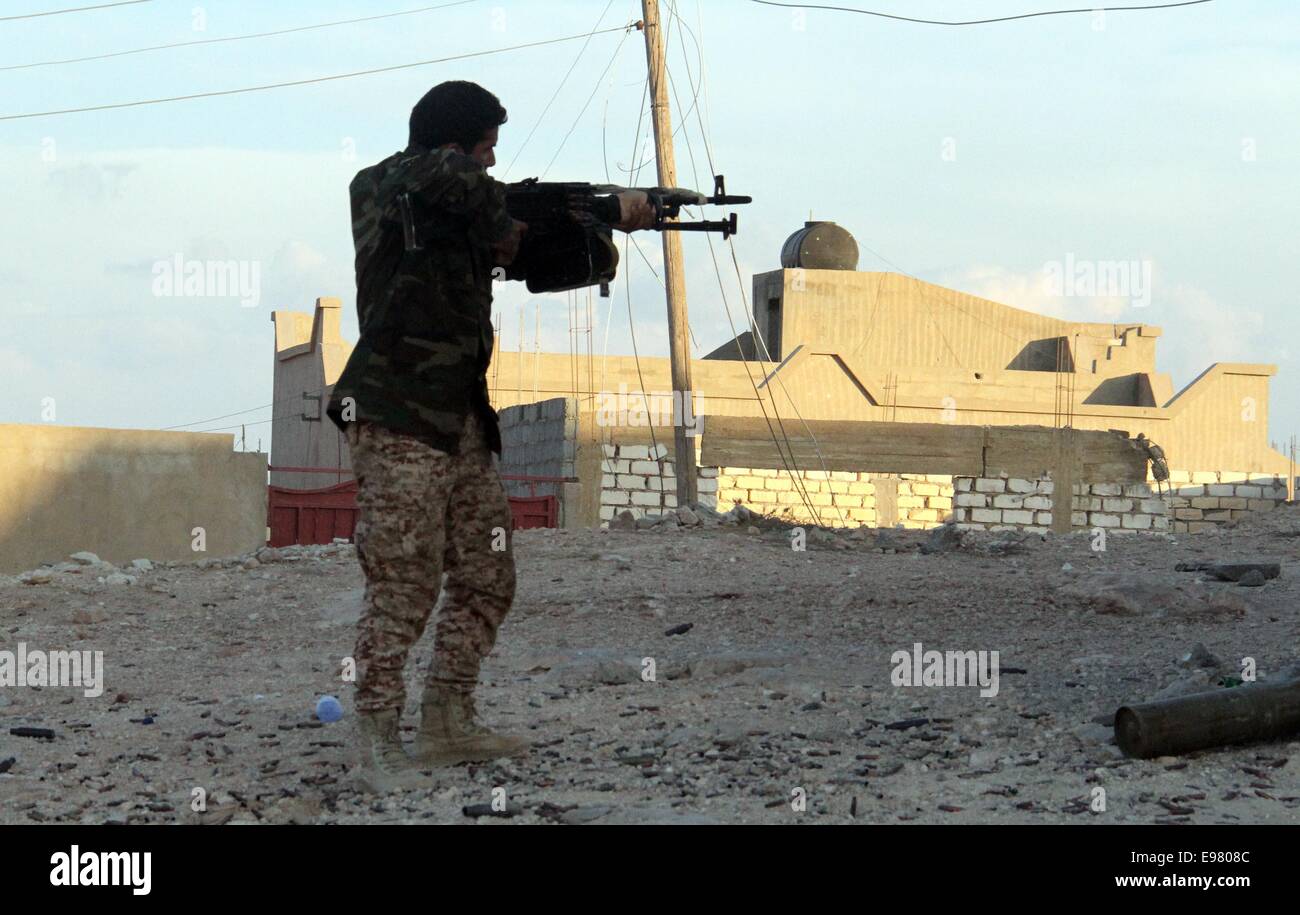 Tripoli, Libya. 21st Oct, 2014. A Libya Dawn fighter holds an AK47 ...