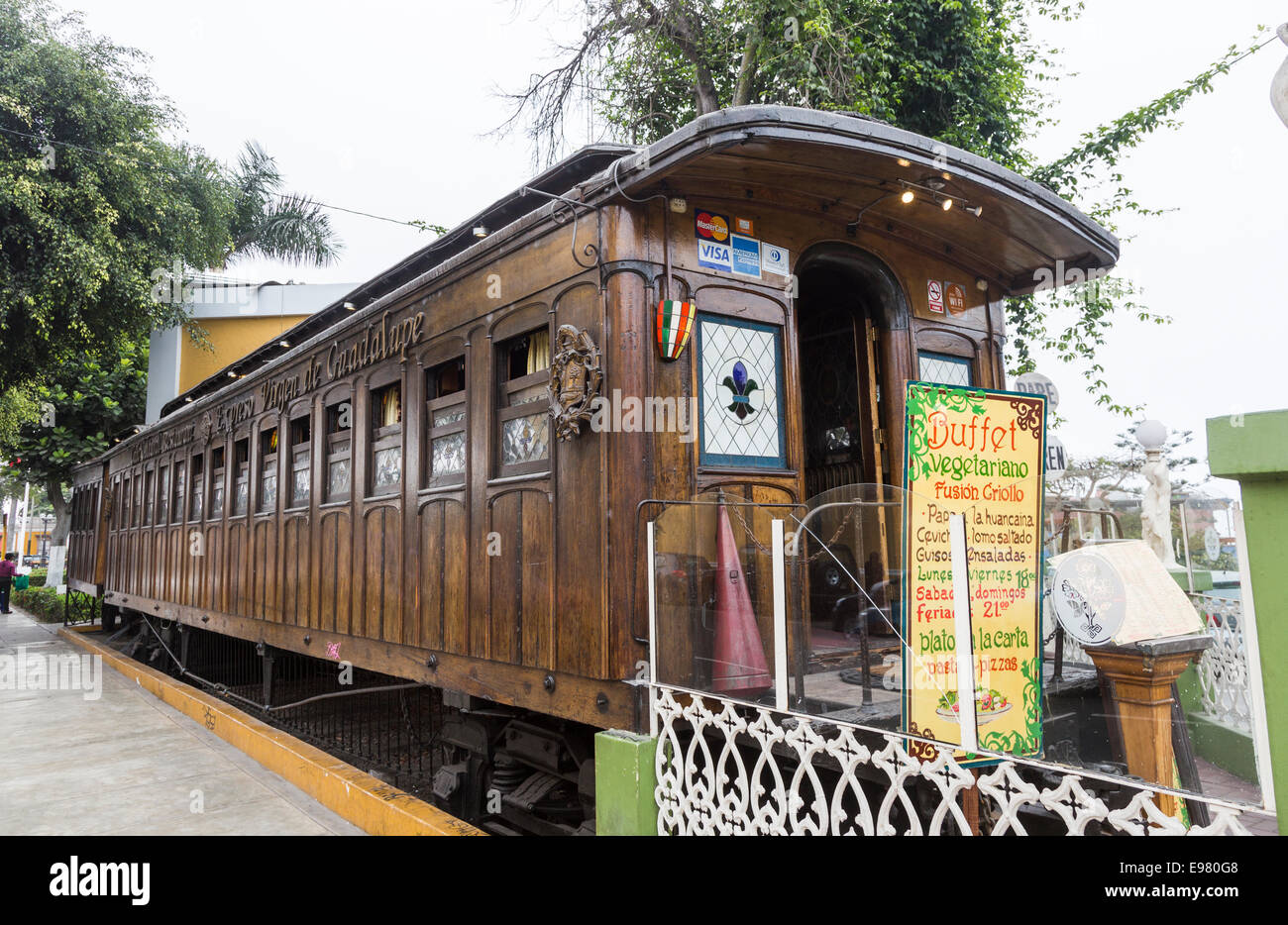 Roadside café or restaurant in a converted, restored old wooden railway ...