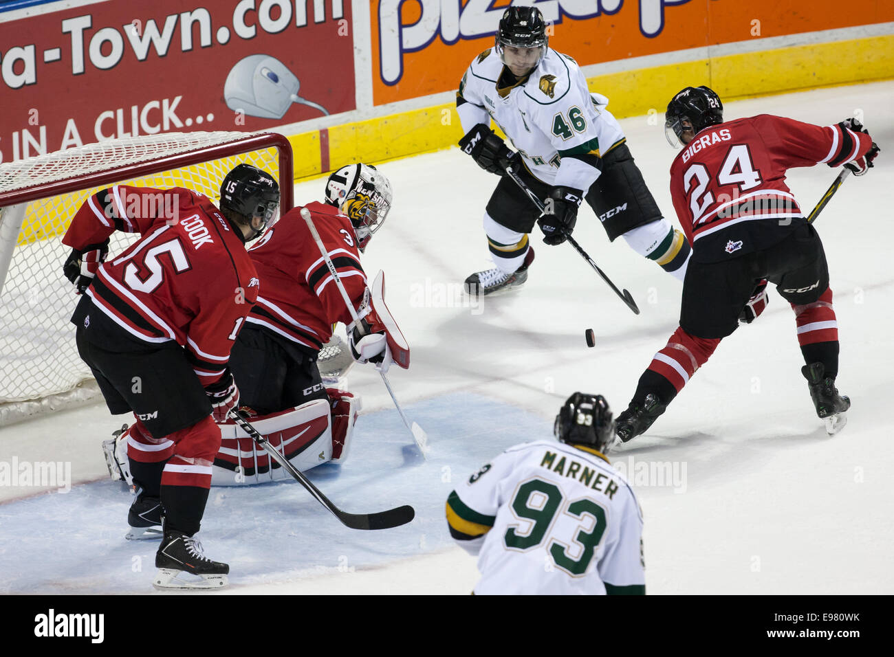 October 17, 2014. Owen Sound Attack goalie Brandon Hope (33) makes a ...