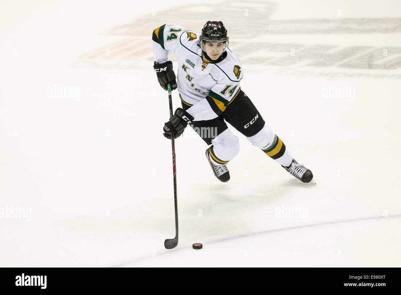 October 17, 2014. London Knights defensman Brandon Crawley (14) carries ...