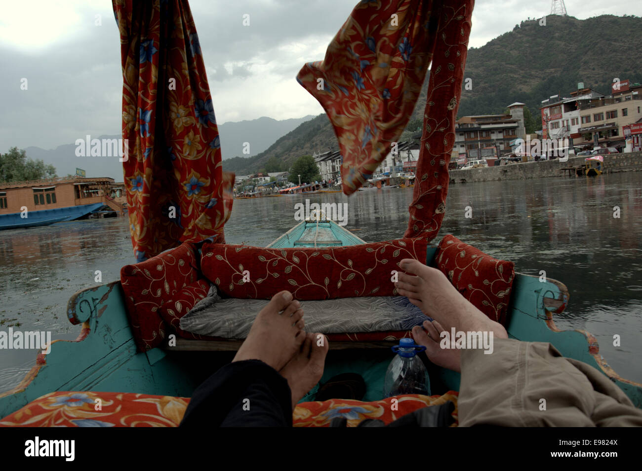 Intimate shikara ride on Dal Lake, Kashmir: A couple's feet frame the ...