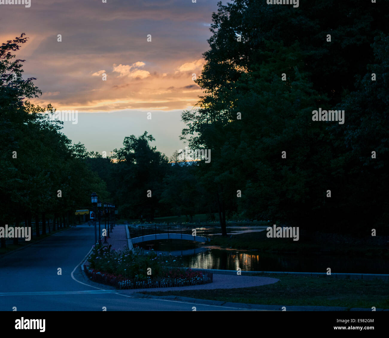 Sunset view park in Massachusetts. On right are reflective pools small ...