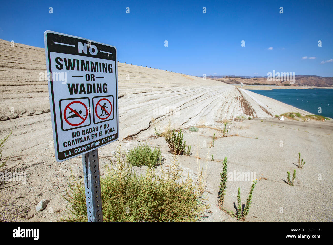 No Swimming or wading sign along incline of Castaic Dam during Summer ...