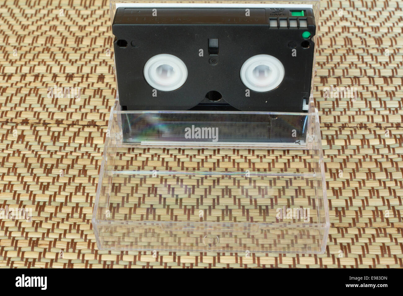 Magazine for the cameras on a straw background Stock Photo - Alamy