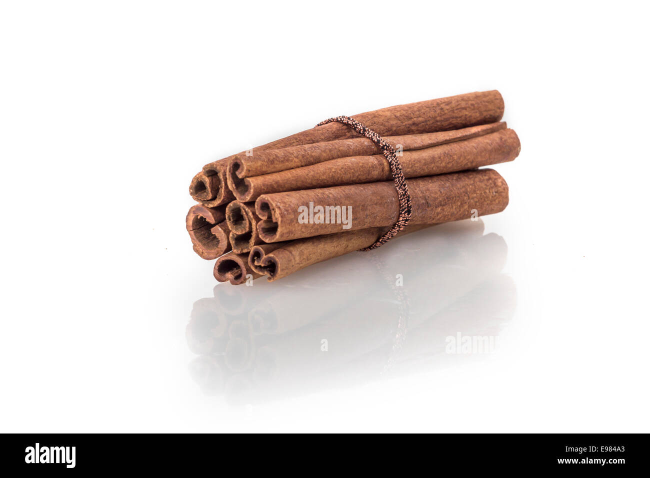 Bundle of Cinnamon Sticks isolated on white background Stock Photo - Alamy
