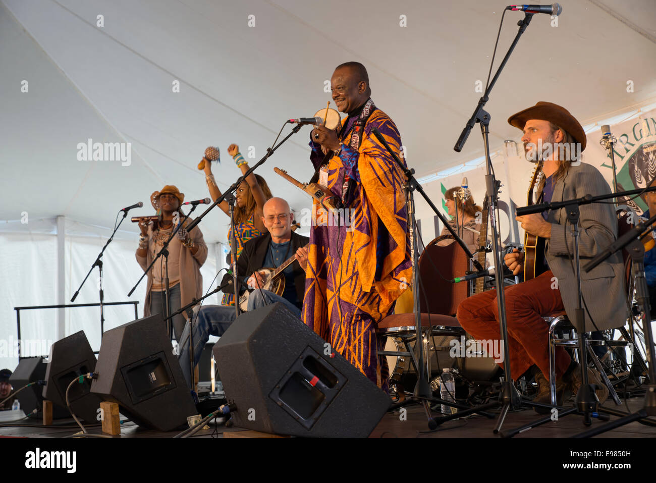 Cheick Hamala Diabate (center) performs with other musicians during a ...