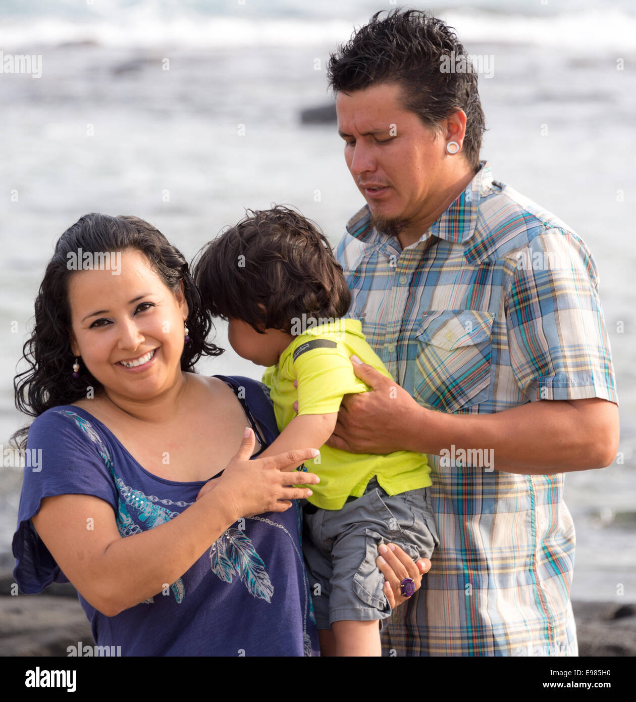 Hispanic son and mother standing hi-res stock photography and images ...