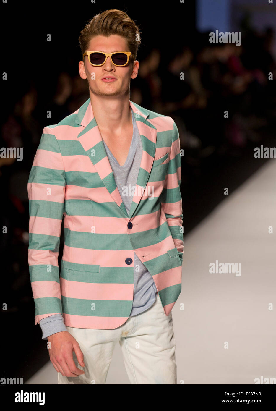 Toronto, Canada. 21st Oct, 2014. A model presents a creation from ...