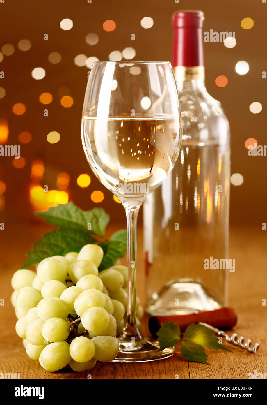 Elegant white wine with grapes on a festive background with beautiful ...