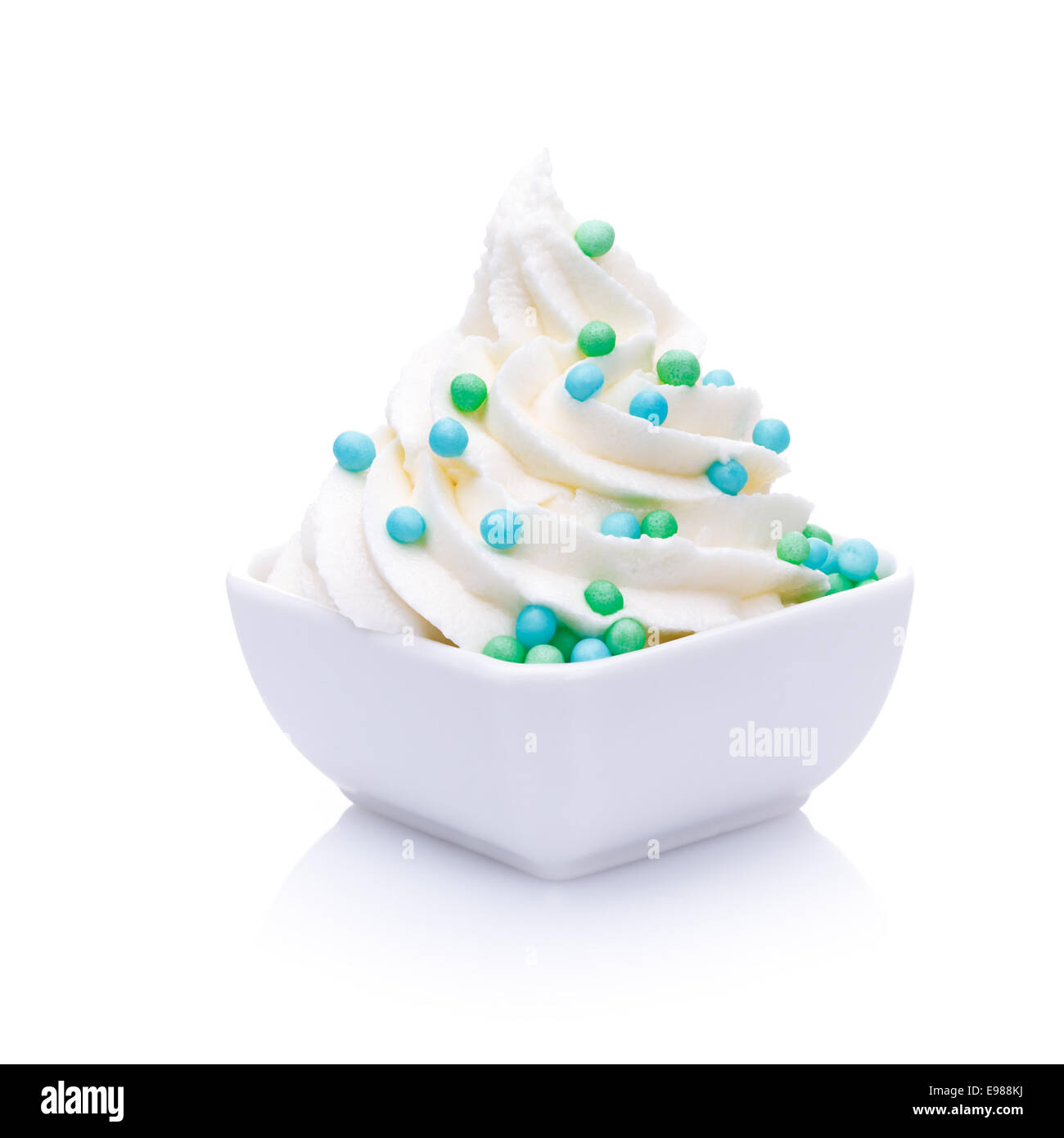 Frozen Yoghurt with candy topping on white background Stock Photo - Alamy