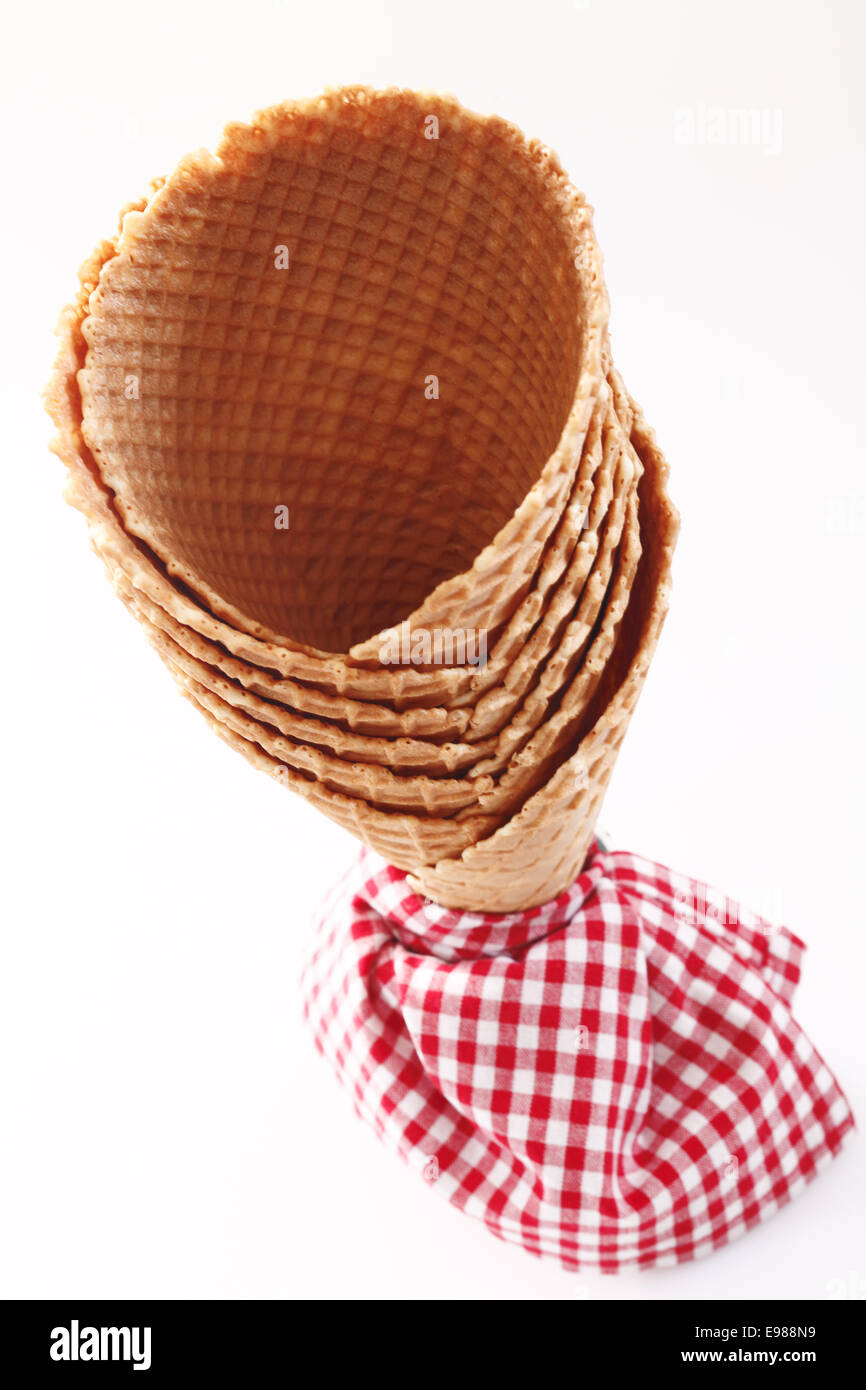 Overhead view of empty ice cream cones with a red and white checkered ...