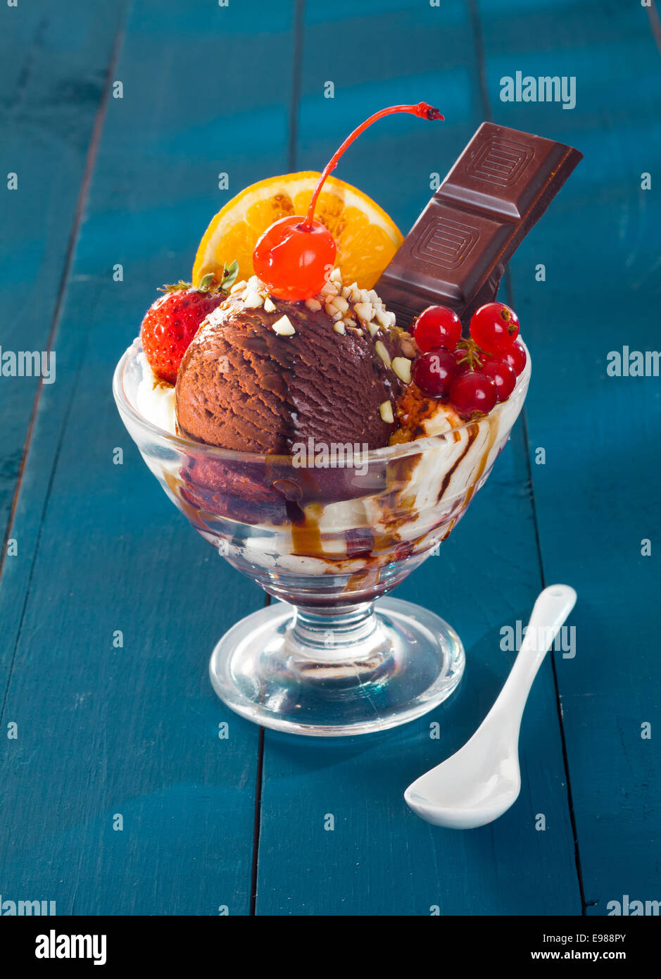 Colourful tropical chocolate dessert with icecream and chocolate ...