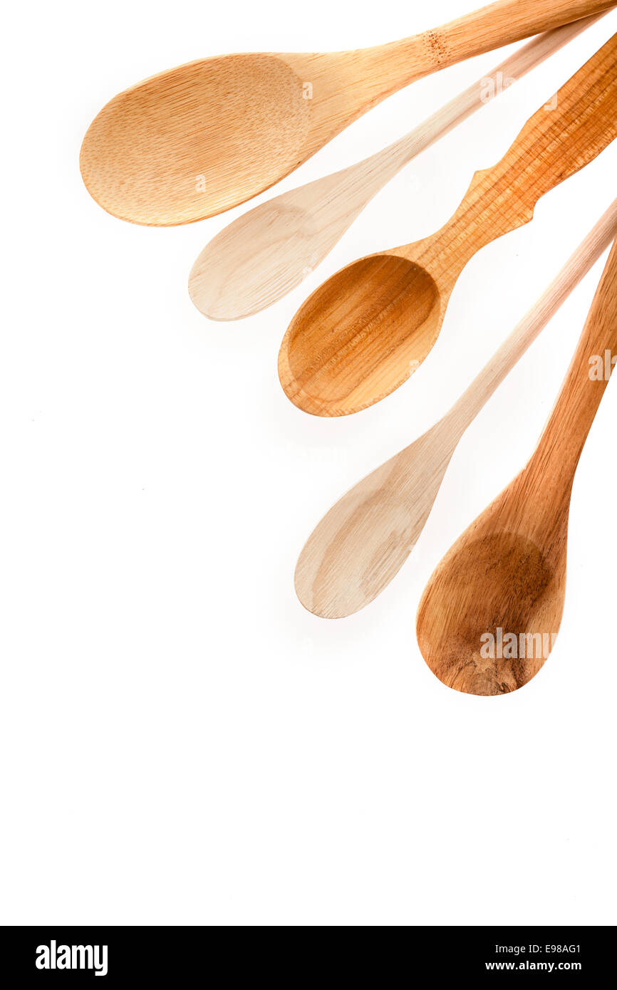 Close-up of different kinds of wooden kitchen utensils isolated on ...