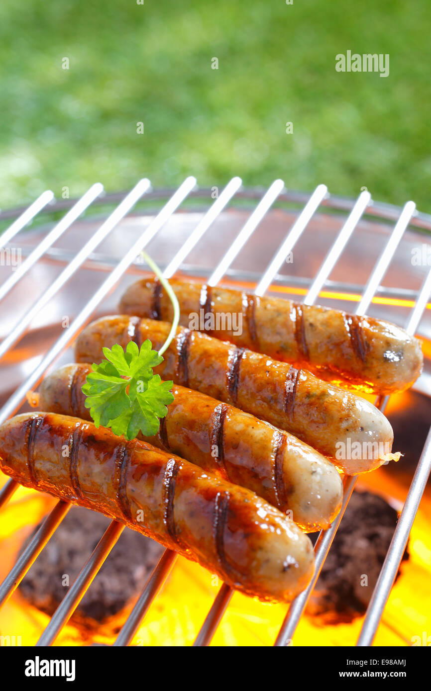 Close up shot of Italian sausage on the grill Stock Photo - Alamy