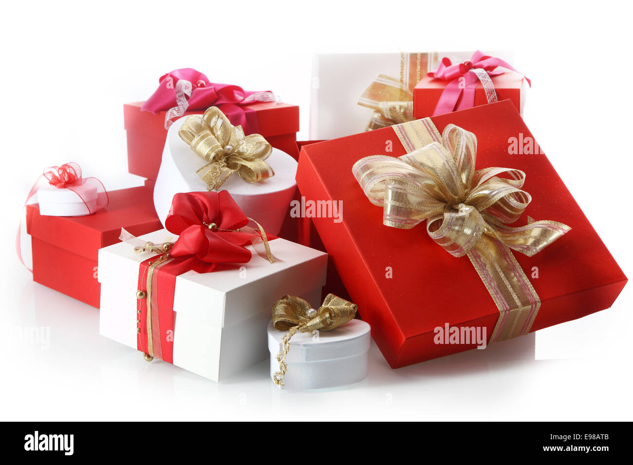 Collection of ornamental red and white gifts in different sizes and ...