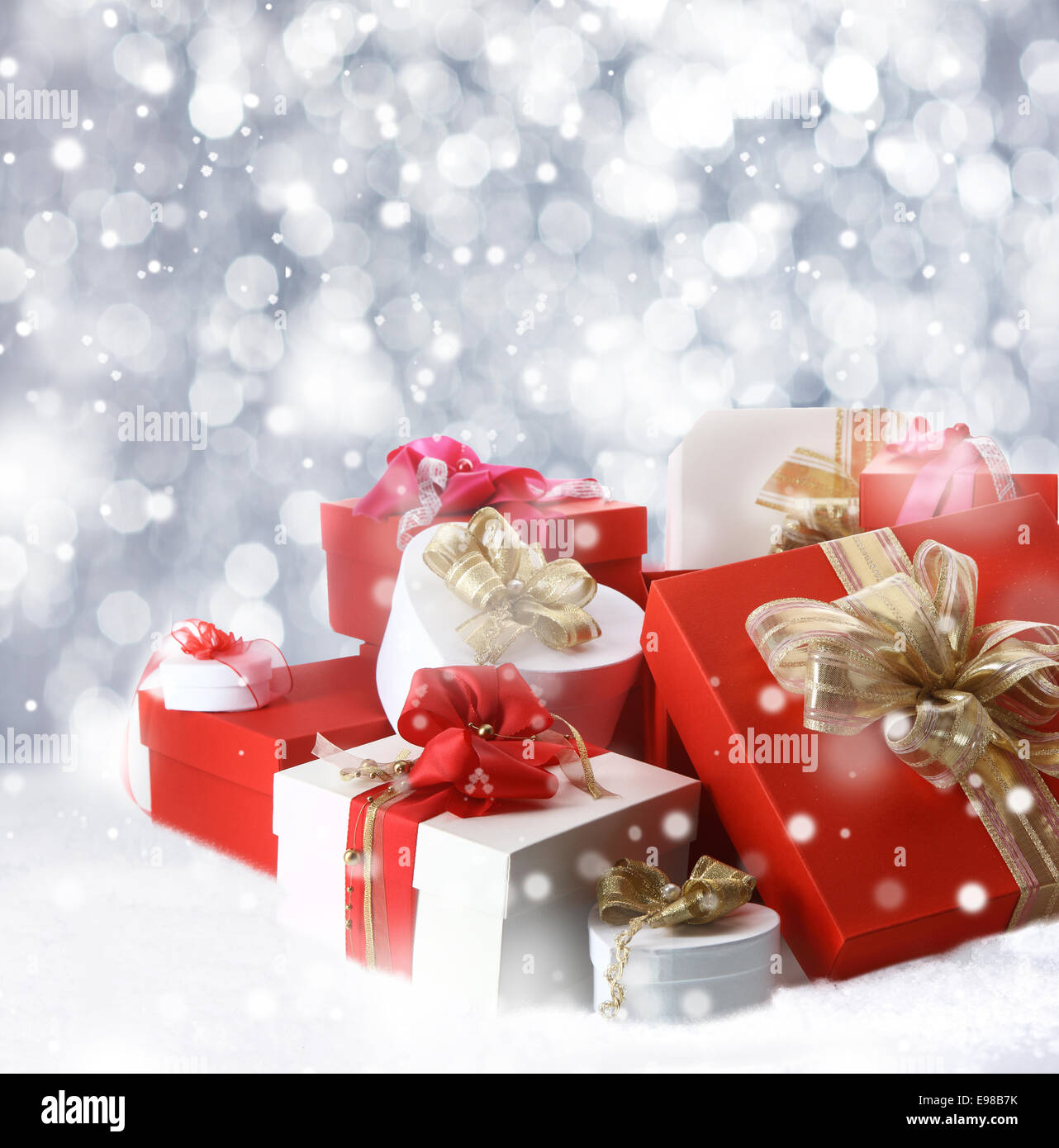 Beautiful collection of red, white and gold decorated Christmas gifts ...
