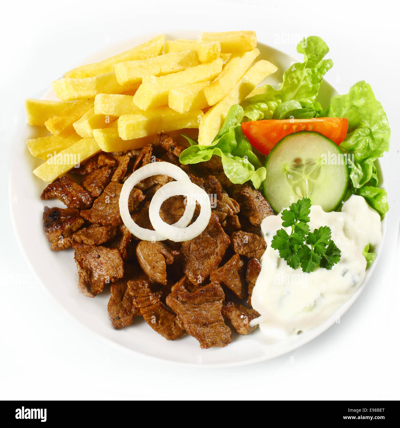Healthy meal of grilled beef nuggets called DÃ¶nerteller, fresh leafy ...