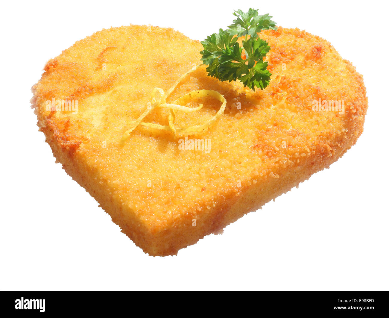 Crispy golden fried heart shaped crumbed escalope garnished with ...