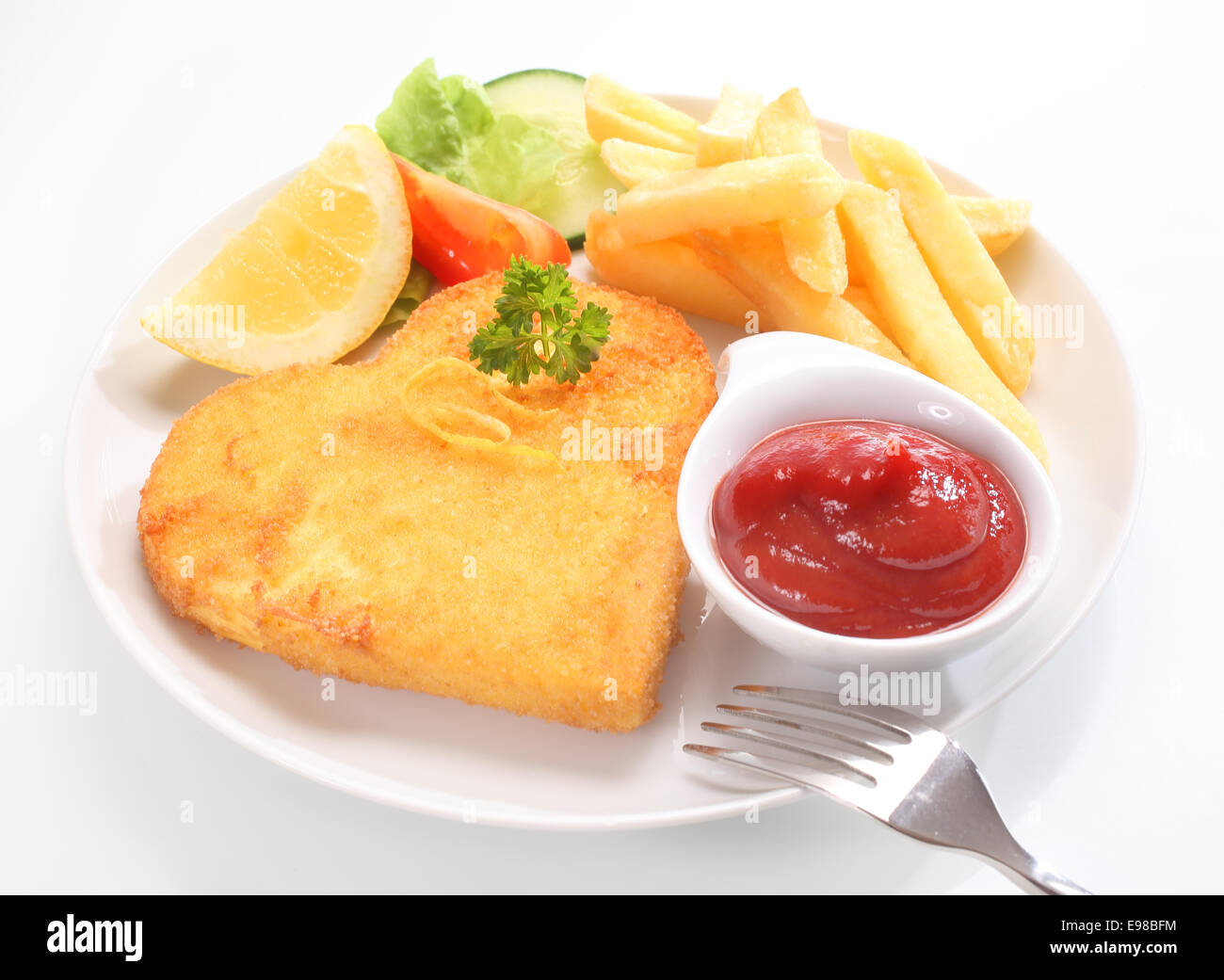 Romantic heart shaped schnitzel in crispy golden friend breadcrumbs ...