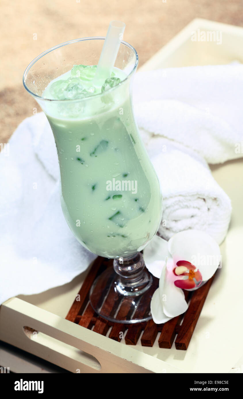 Photo of a chilled wellness delicious looking drink with towels in ...