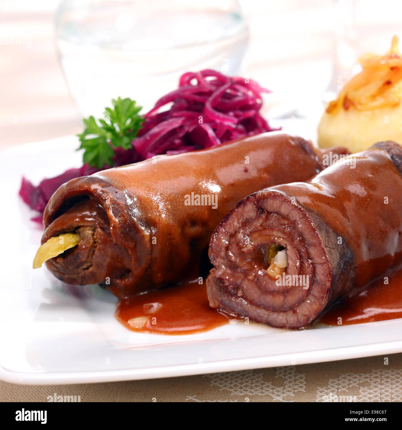 Two healthy lean beef roulades with thinly sliced meat rolled around a ...