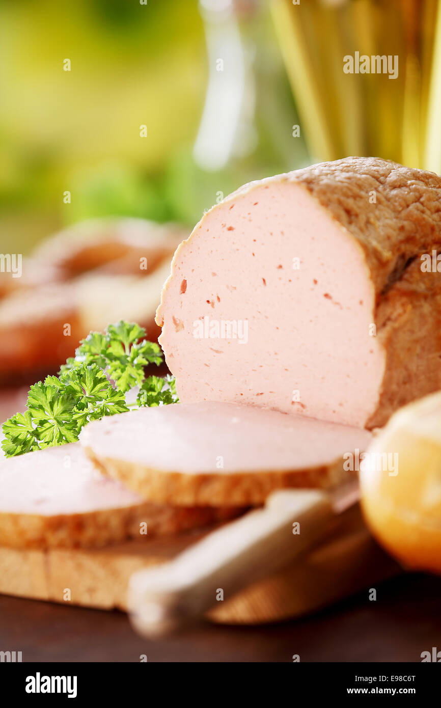 Traditional German meat loaf or Leberkaese made from ground beef, pork ...