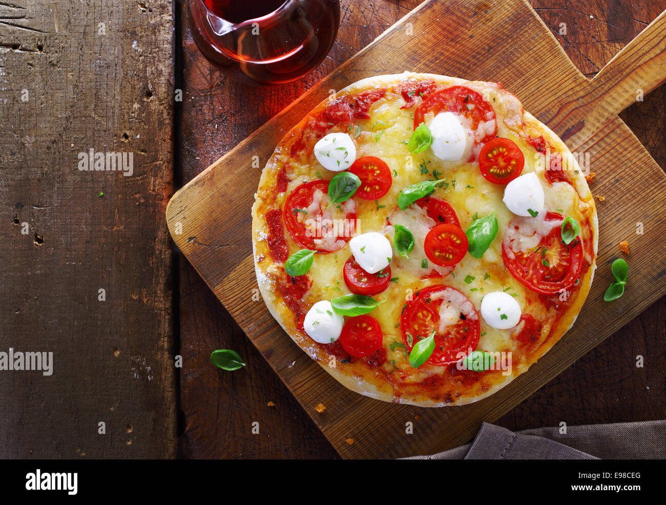 Overhead view of a colourful gourmet Italian pizza with a variety of ...