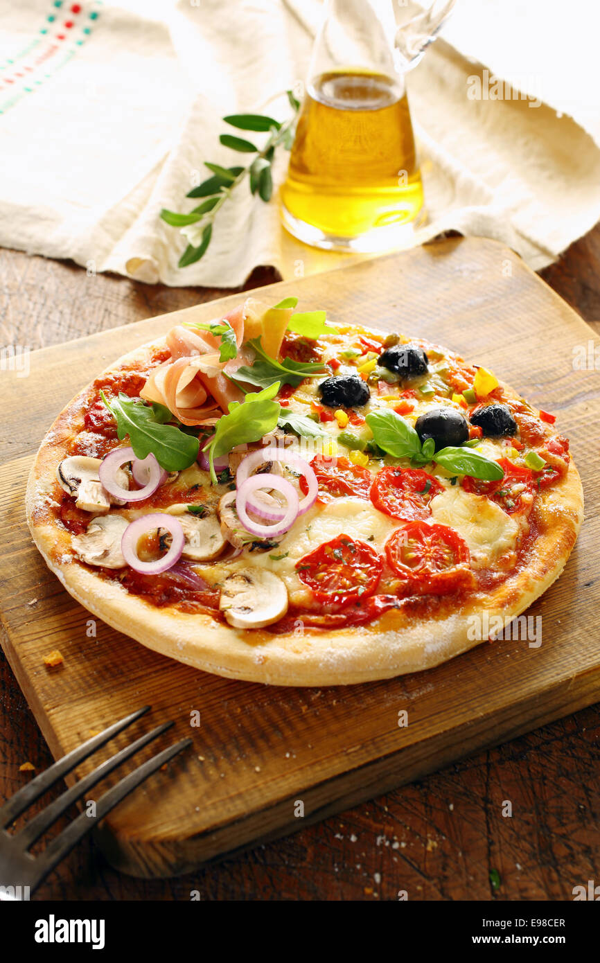Gourmet Italian four seasons pizza with all the toppings including ...