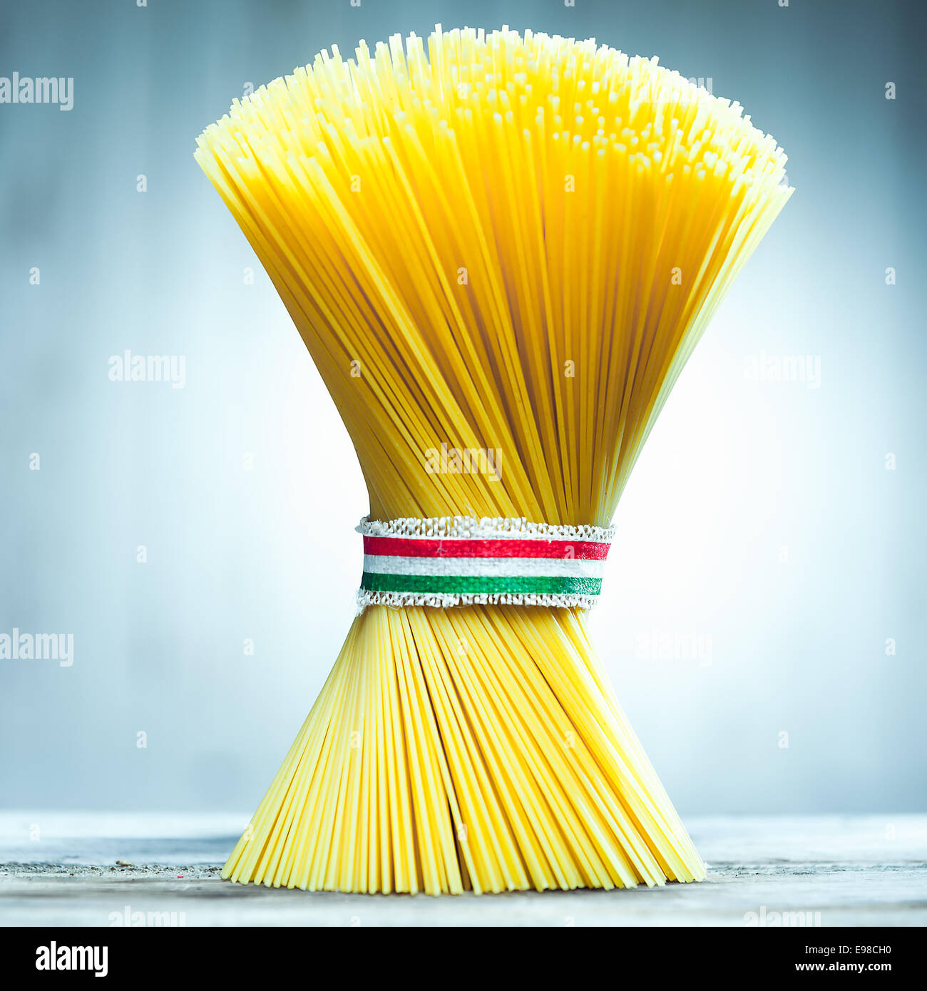 Pile of raw spaghetti, ingredients for traditional Italian pasta ...