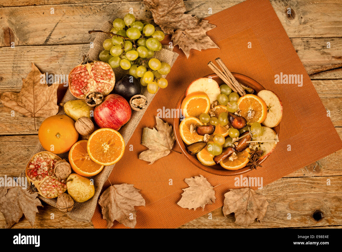 Still life with an assortment of seasonal autumn fruit Stock Photo - Alamy