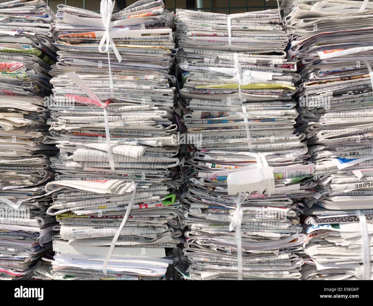 Tying newspaper hi-res stock photography and images - Alamy