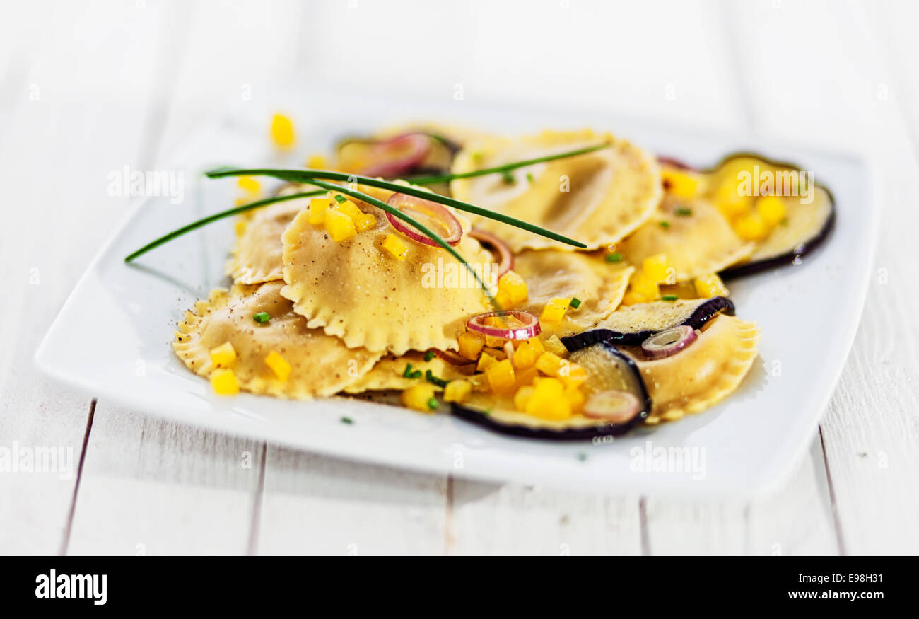 Delicious tasty Italian ravioli pasta with slices of sauteed or roasted ...