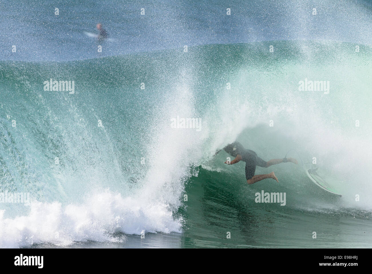Surfer Surfing tube rides hollow ocean wave action photo sequence Stock ...