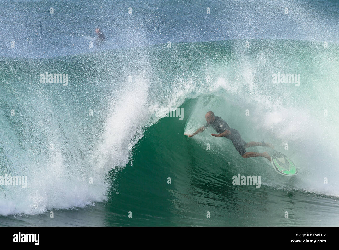 Surfer Surfing tube rides hollow ocean wave action photo sequence Stock ...