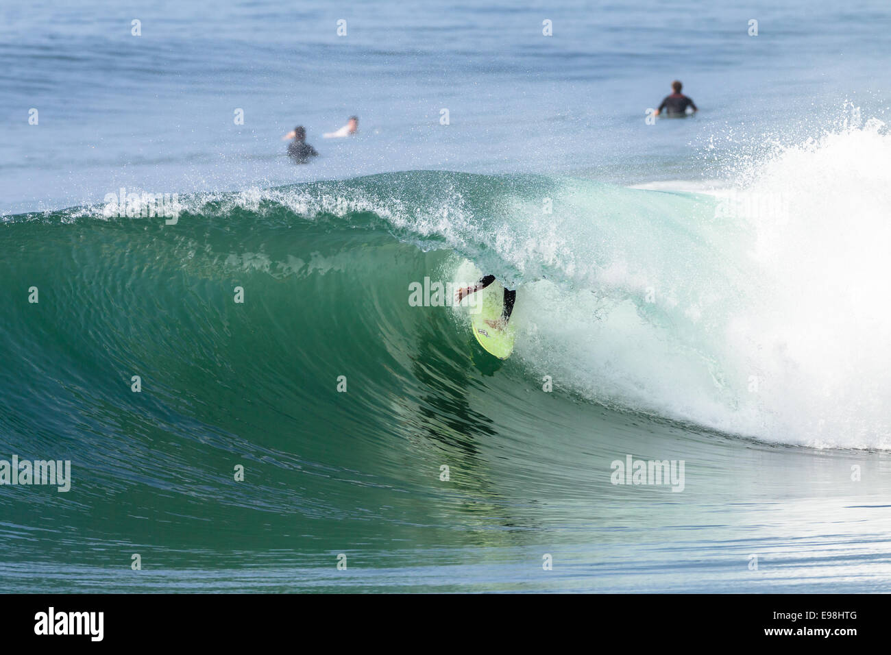 Surfer Surfing tube rides hollow ocean wave action photo sequence Stock ...