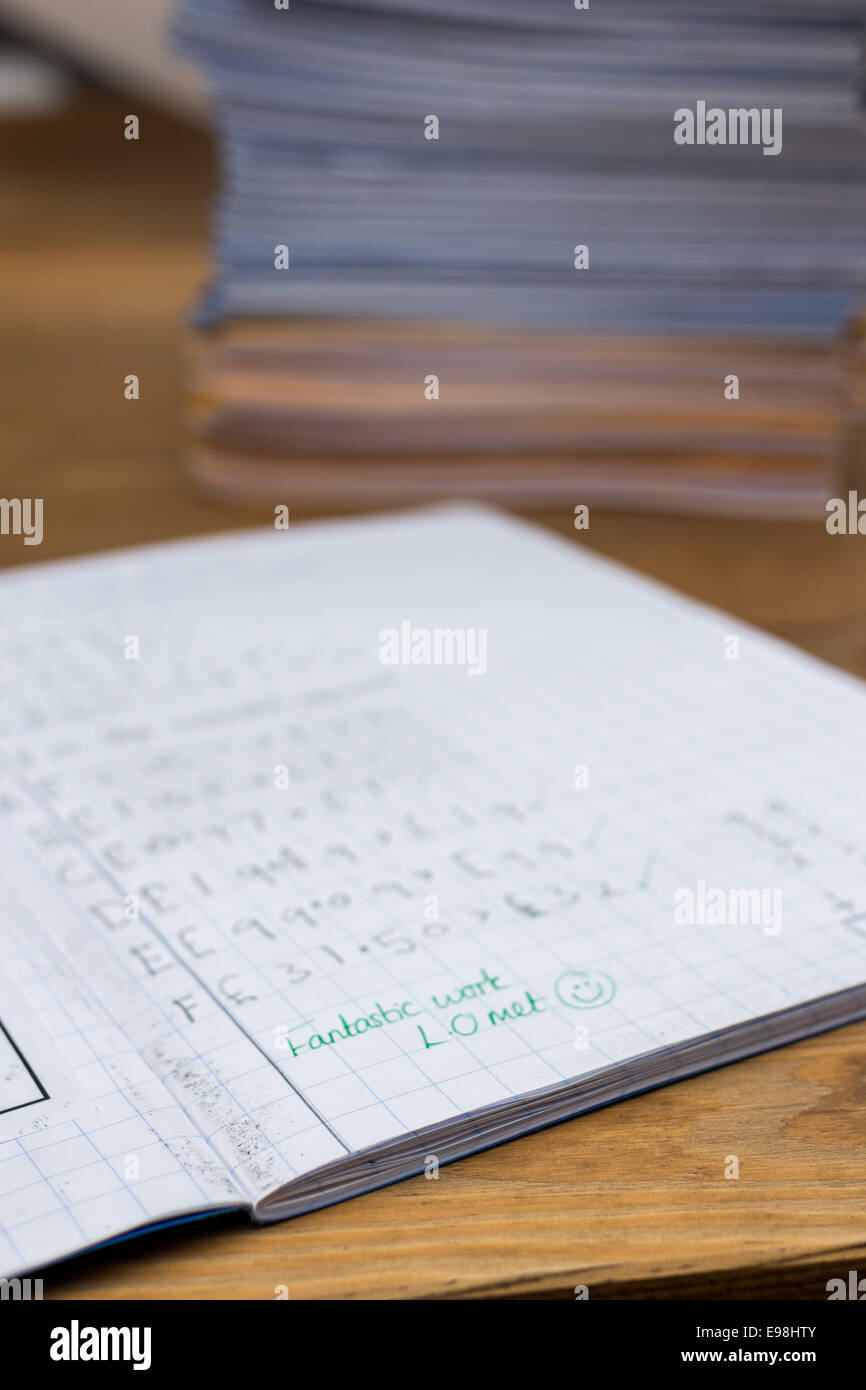 Teacher marking school books hi-res stock photography and images - Alamy