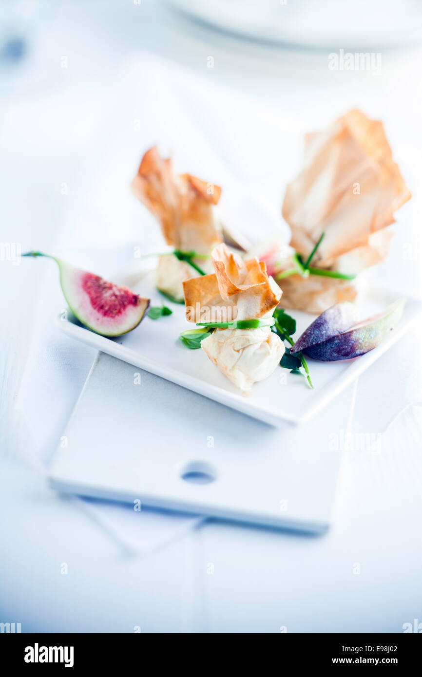 Serve with Art Tasty Dessert in Flaky Pastry Bonbons on Table, Isolated ...