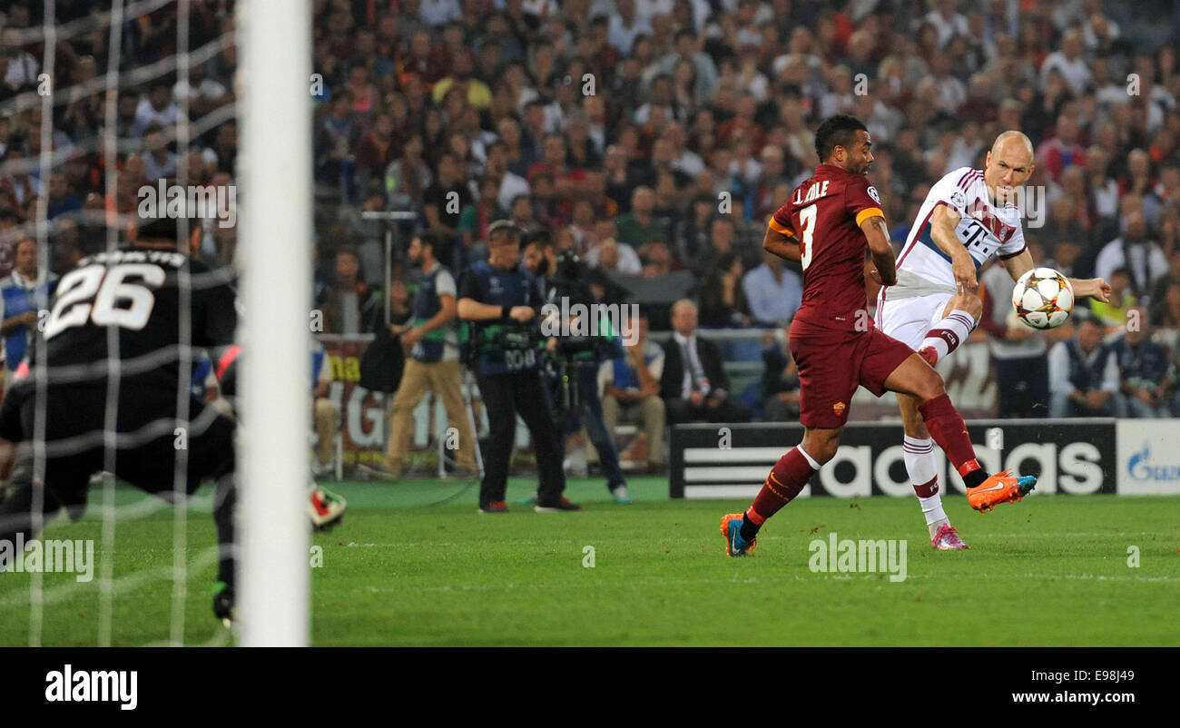 Rome, Italy. 21st Oct, 2014. Munich's Arjen Robben (R) scores the first ...