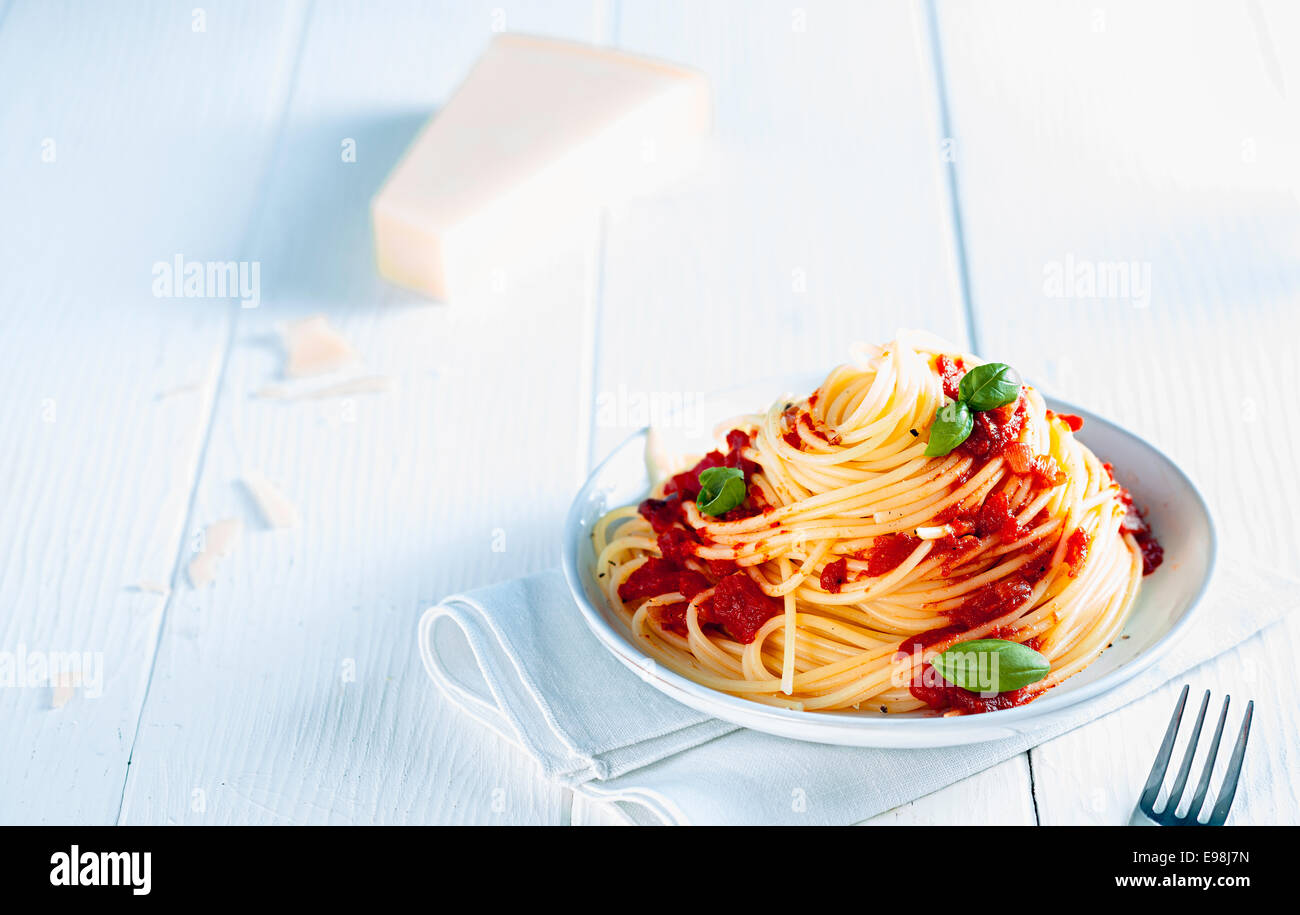 Gourmet Tasty Italian Spaghetti in Plate on White Table Background ...