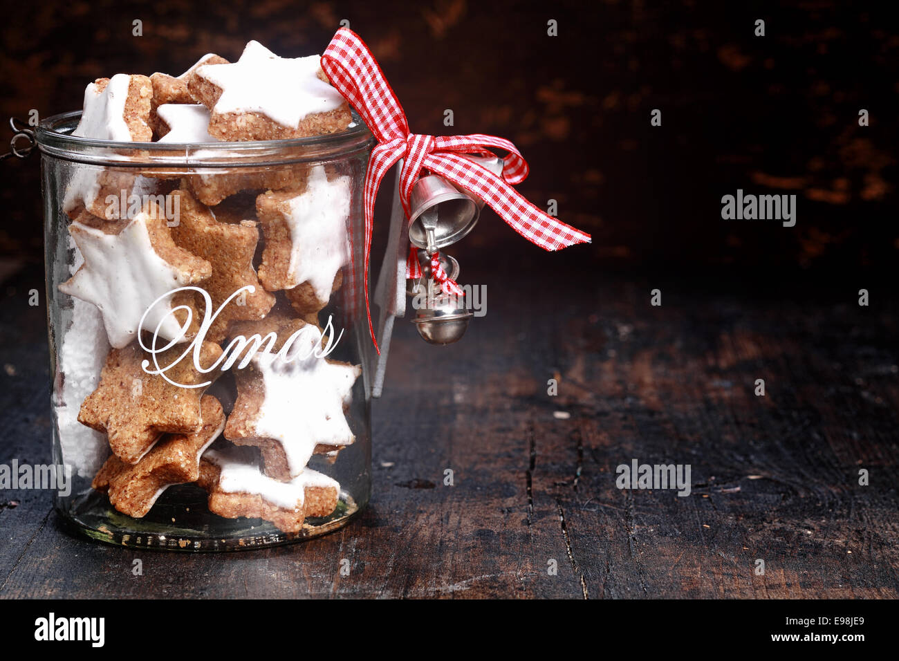 Tasty Christmas Cookies in Transparent Pot with Silver Bells, Isolated ...